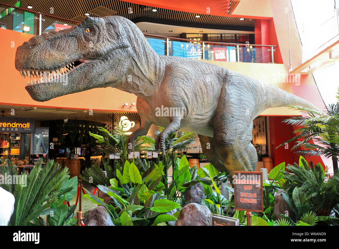 A dinosaur model is on display at the Jurassic World exhibition in Hong ...