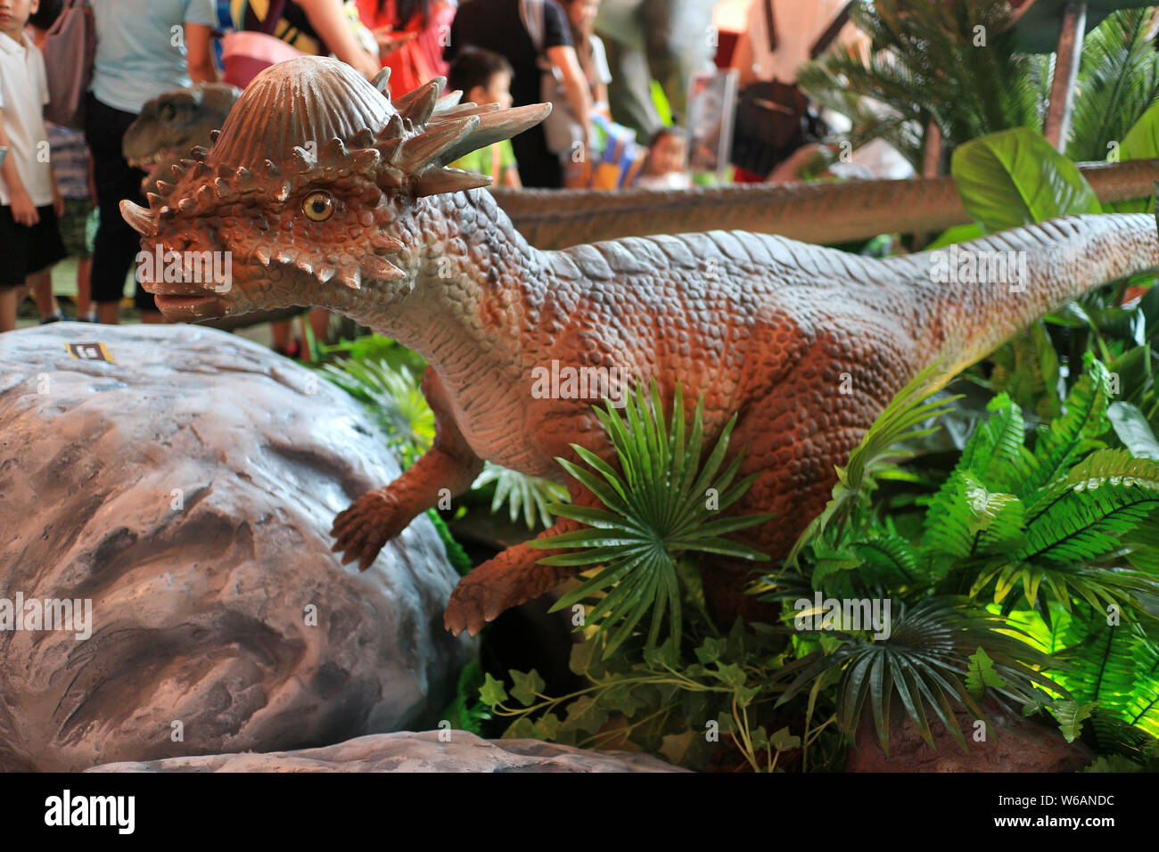 A dinosaur model is on display at the Jurassic World exhibition in Hong ...
