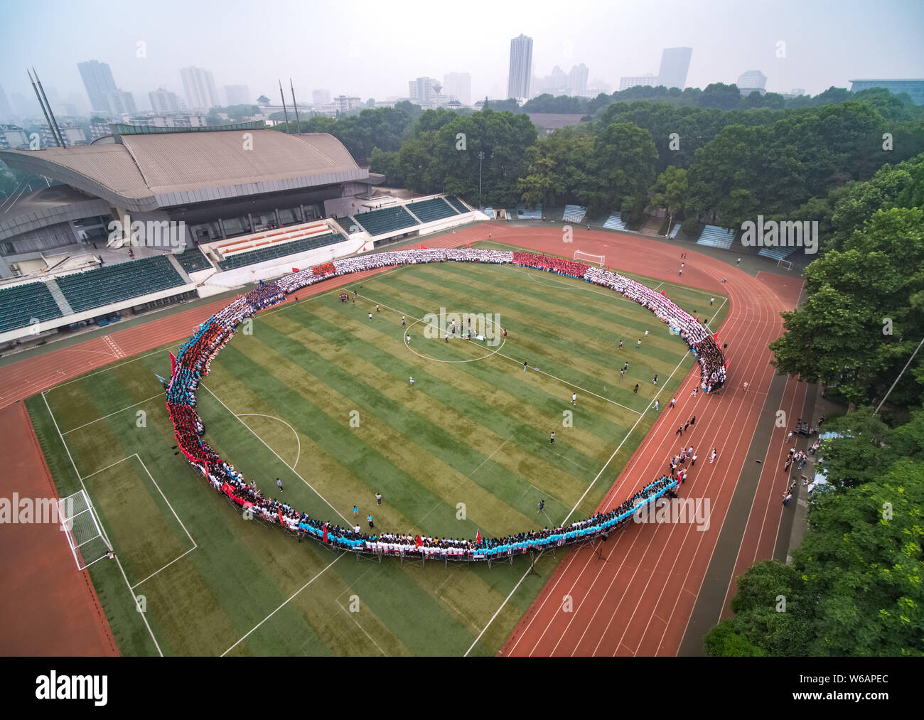 In this aerial picture, more than 4,000 graduates and their teachers ...