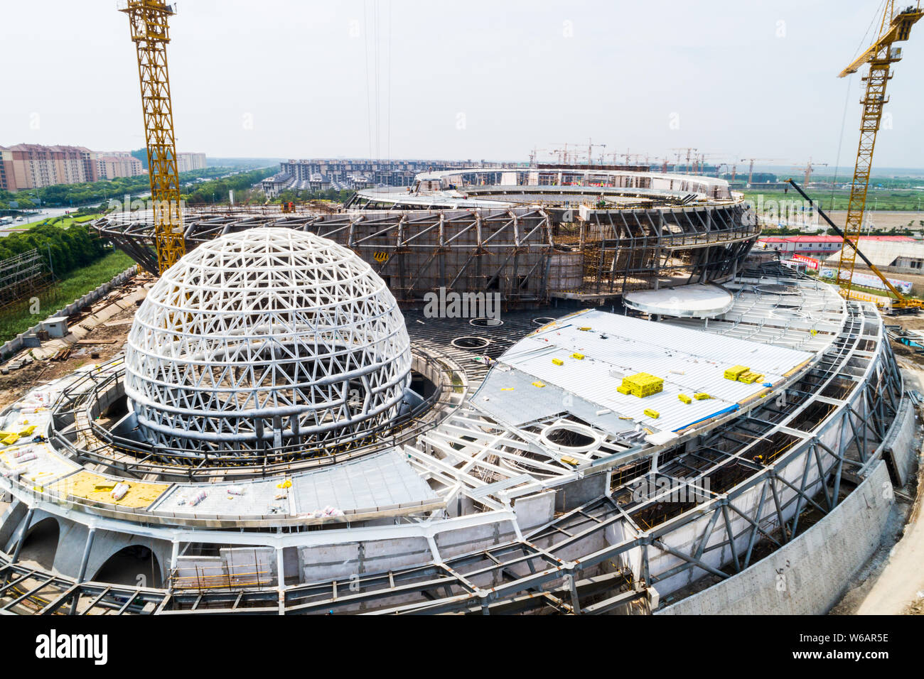 An aerial view of the Shanghai Planetarium under construction, which ...
