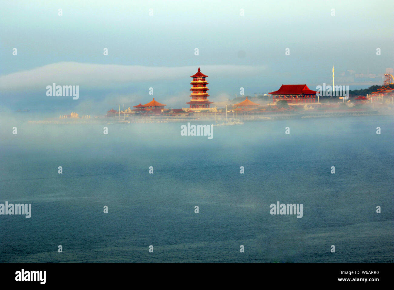 A pavilion is surrounded by mist and cloud in Penglai city, Yantai city ...