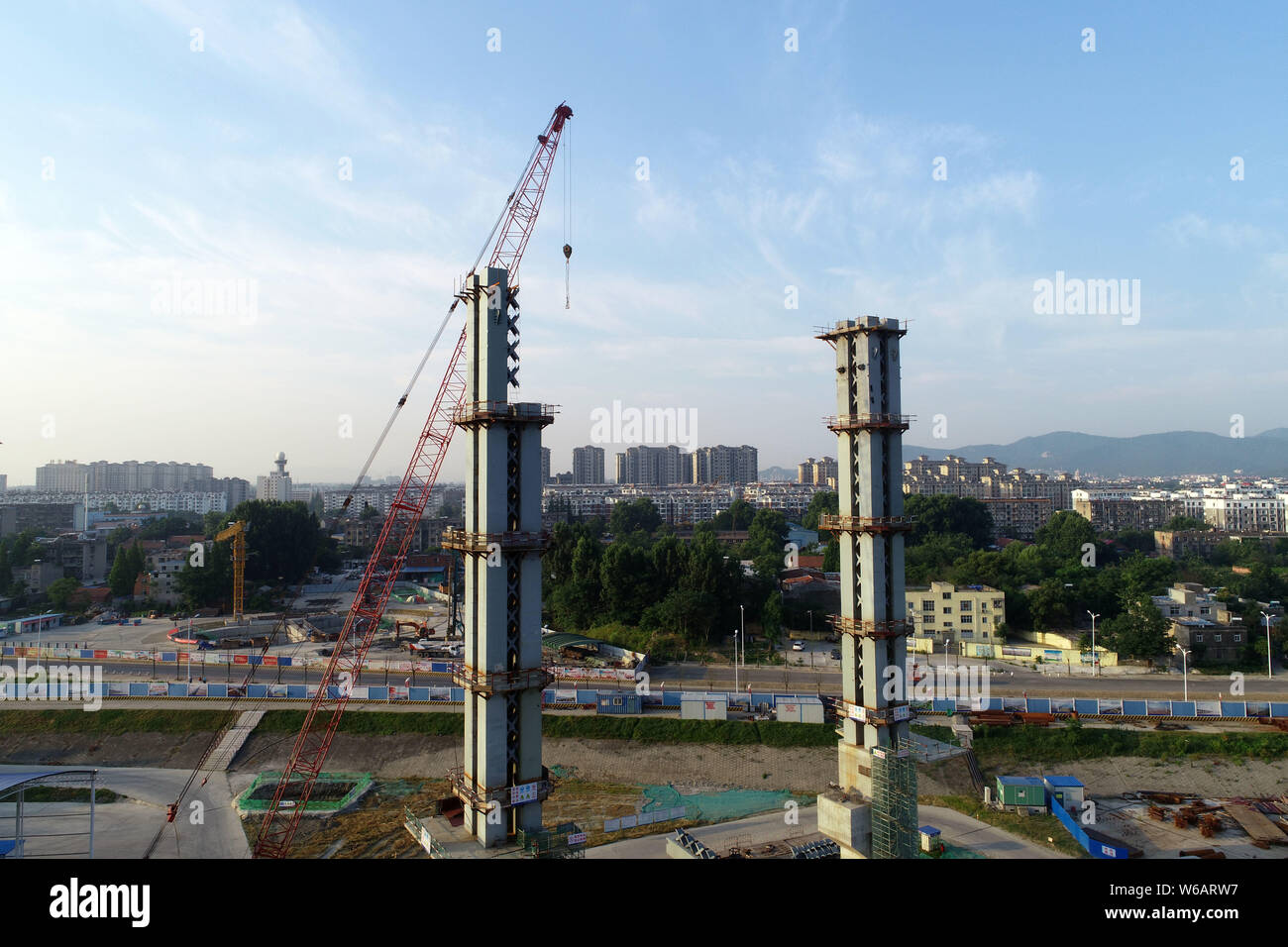 Aerial view of the construction site of the Panggong suspension bridge ...