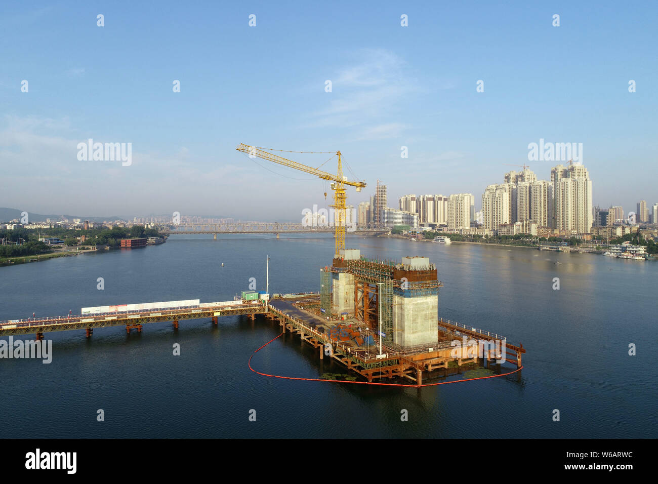 Aerial view of the construction site of the Panggong suspension bridge ...