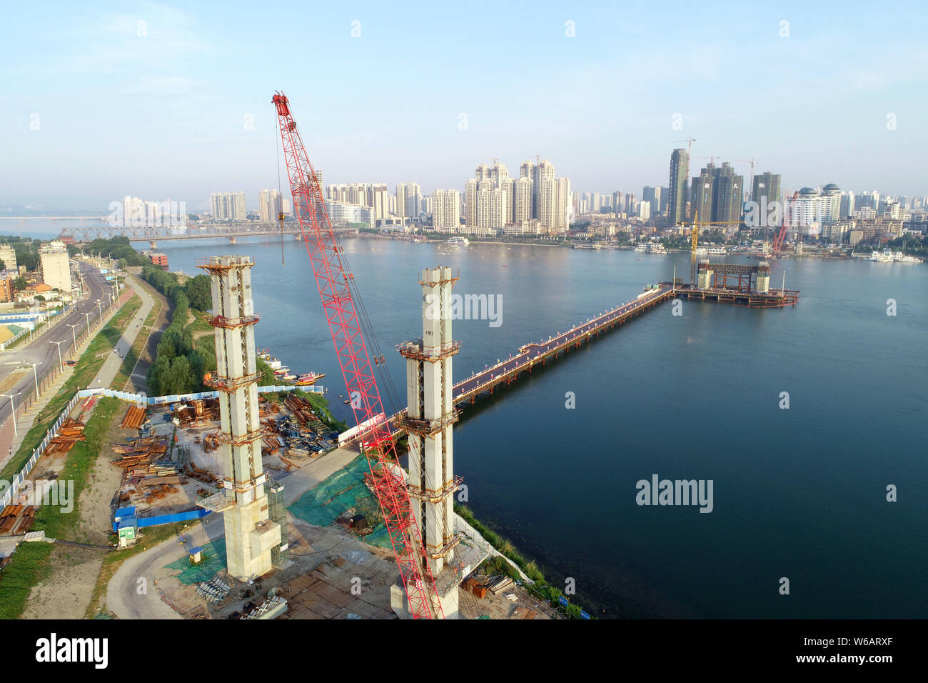 Aerial view of the construction site of the Panggong suspension bridge ...