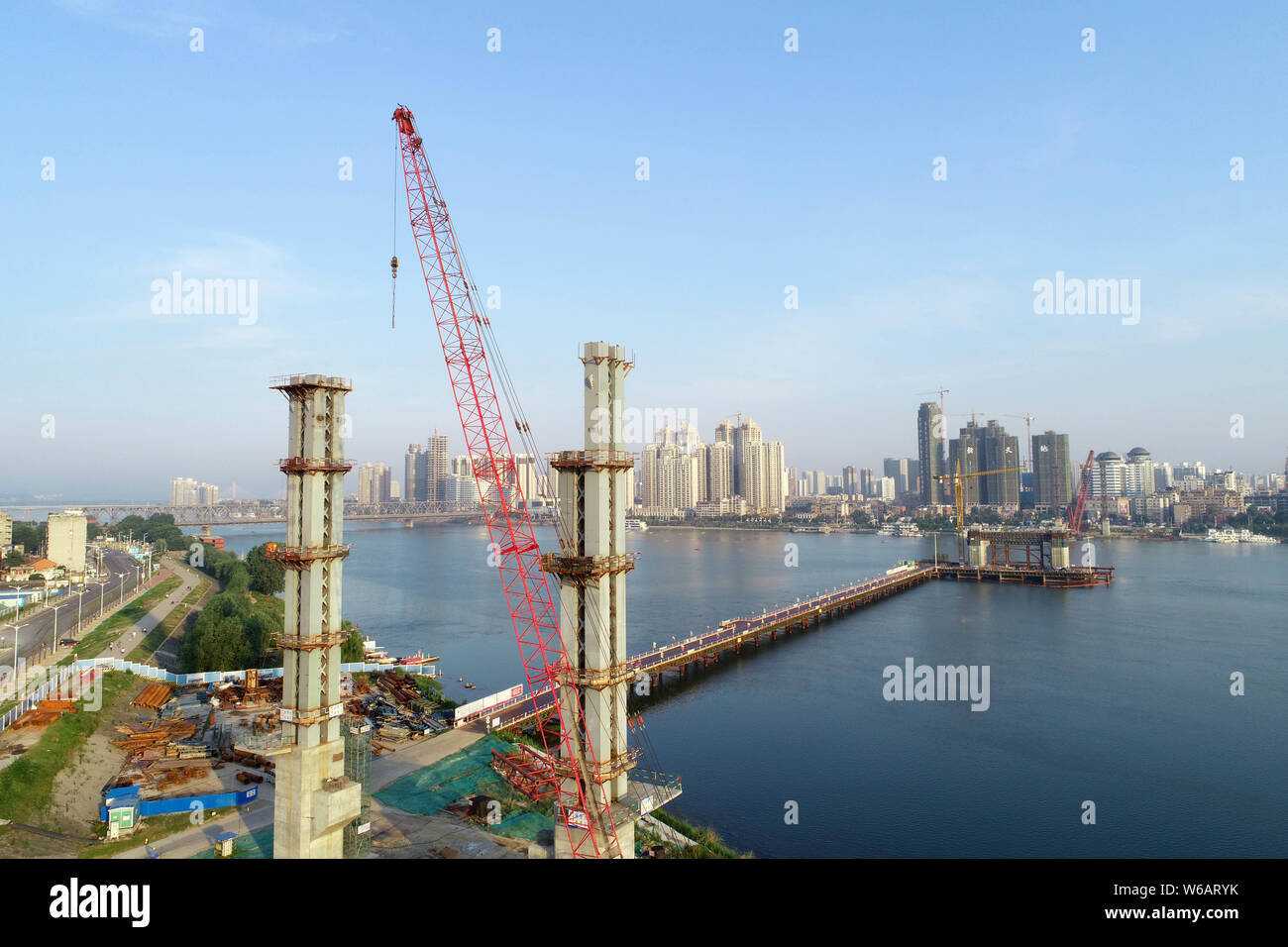 Aerial view of the construction site of the Panggong suspension bridge ...