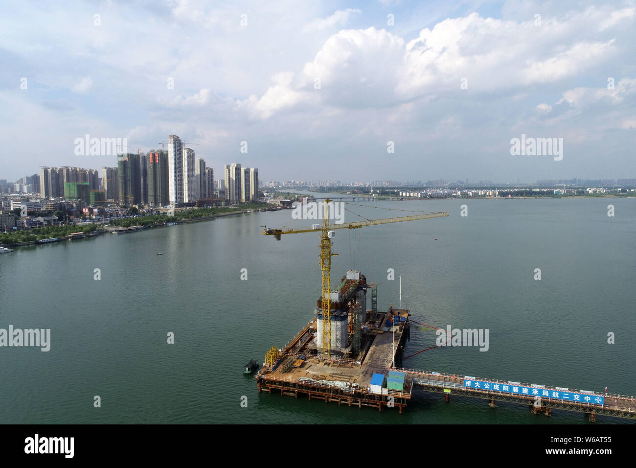 Aerial view of the construction site of the Panggong suspension bridge ...