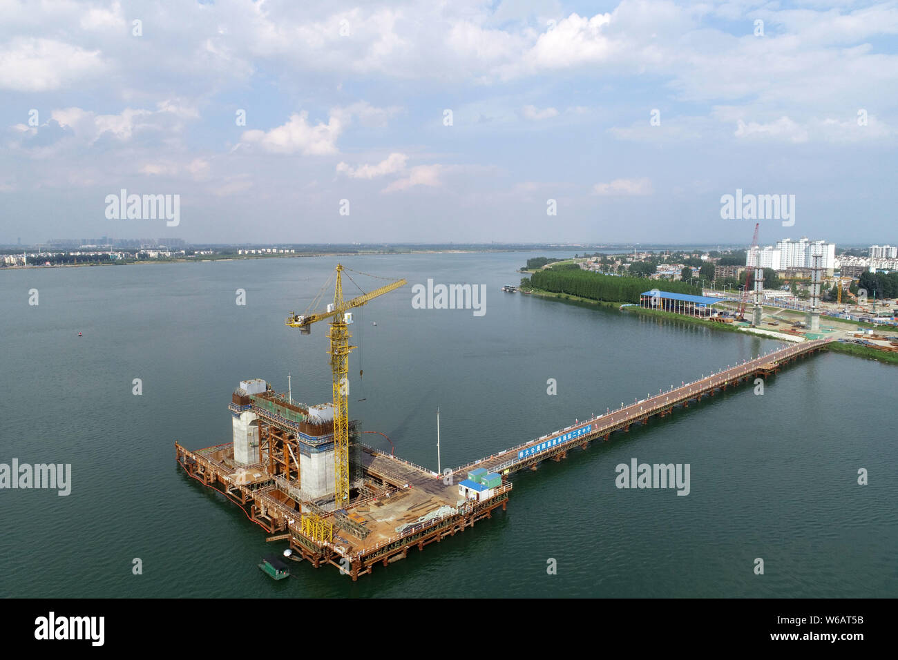 Aerial view of the construction site of the Panggong suspension bridge ...