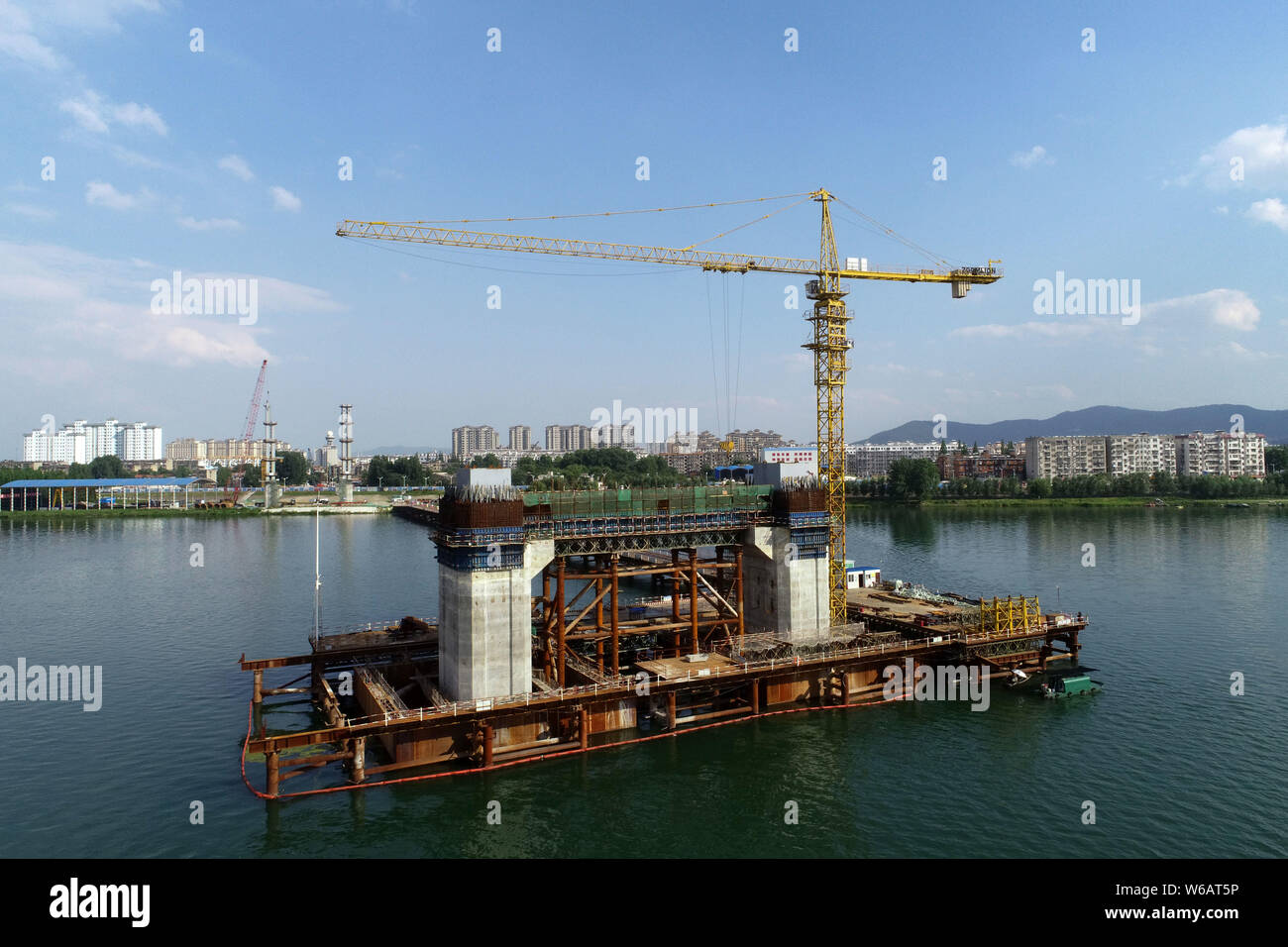Aerial view of the construction site of the Panggong suspension bridge ...