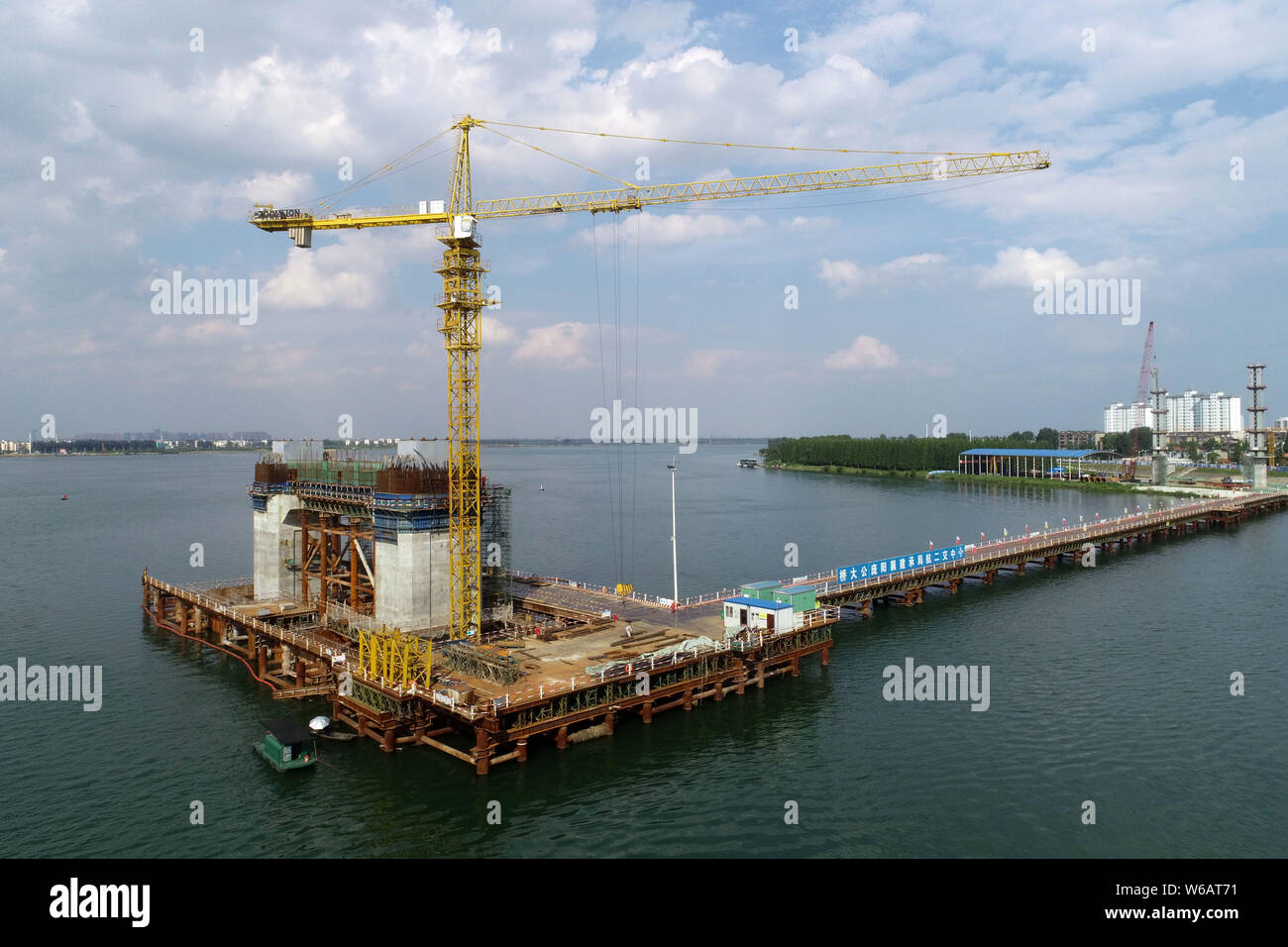 Aerial view of the construction site of the Panggong suspension bridge ...