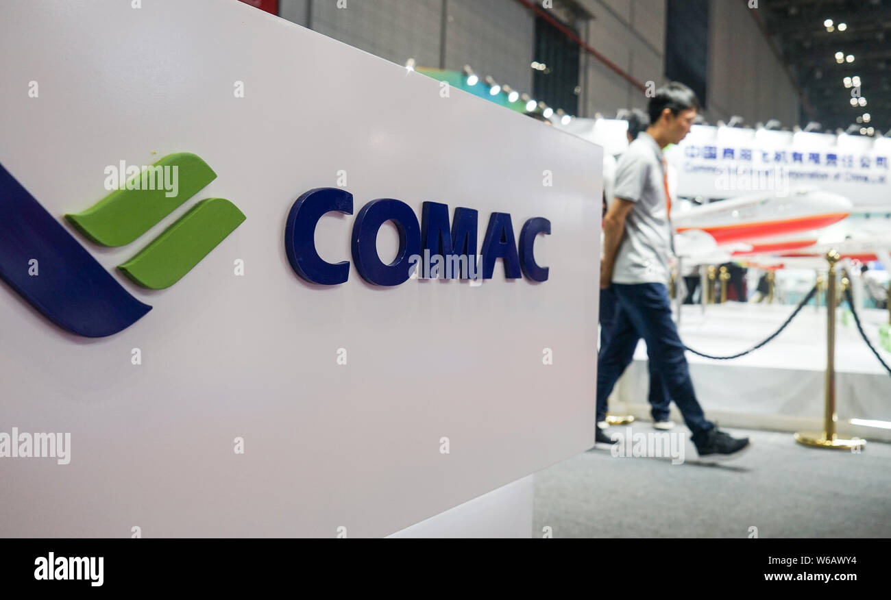 --FILE--Visitors walk past the stand of Commercial Aircraft Corporation ...