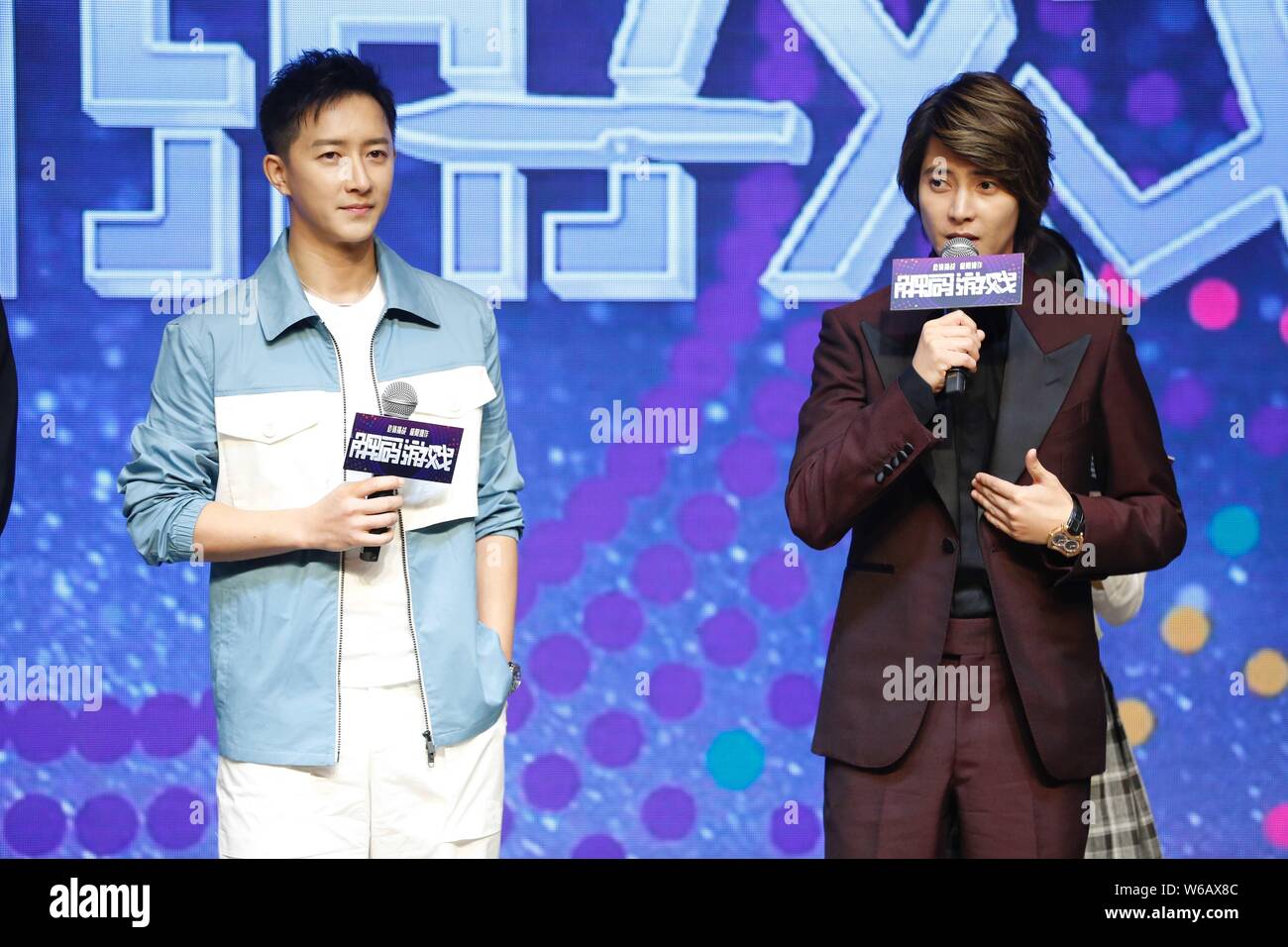 Japanese actor and singer Tomohisa Yamashita, also widely known as Yamapi, right, and Chinese ...