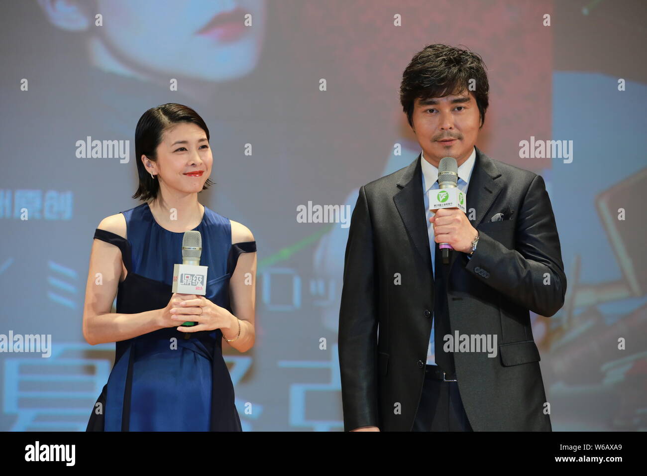 Japanese actress Yuko Takeuchi, left, and actor Yukiyoshi Ozawa attend ...