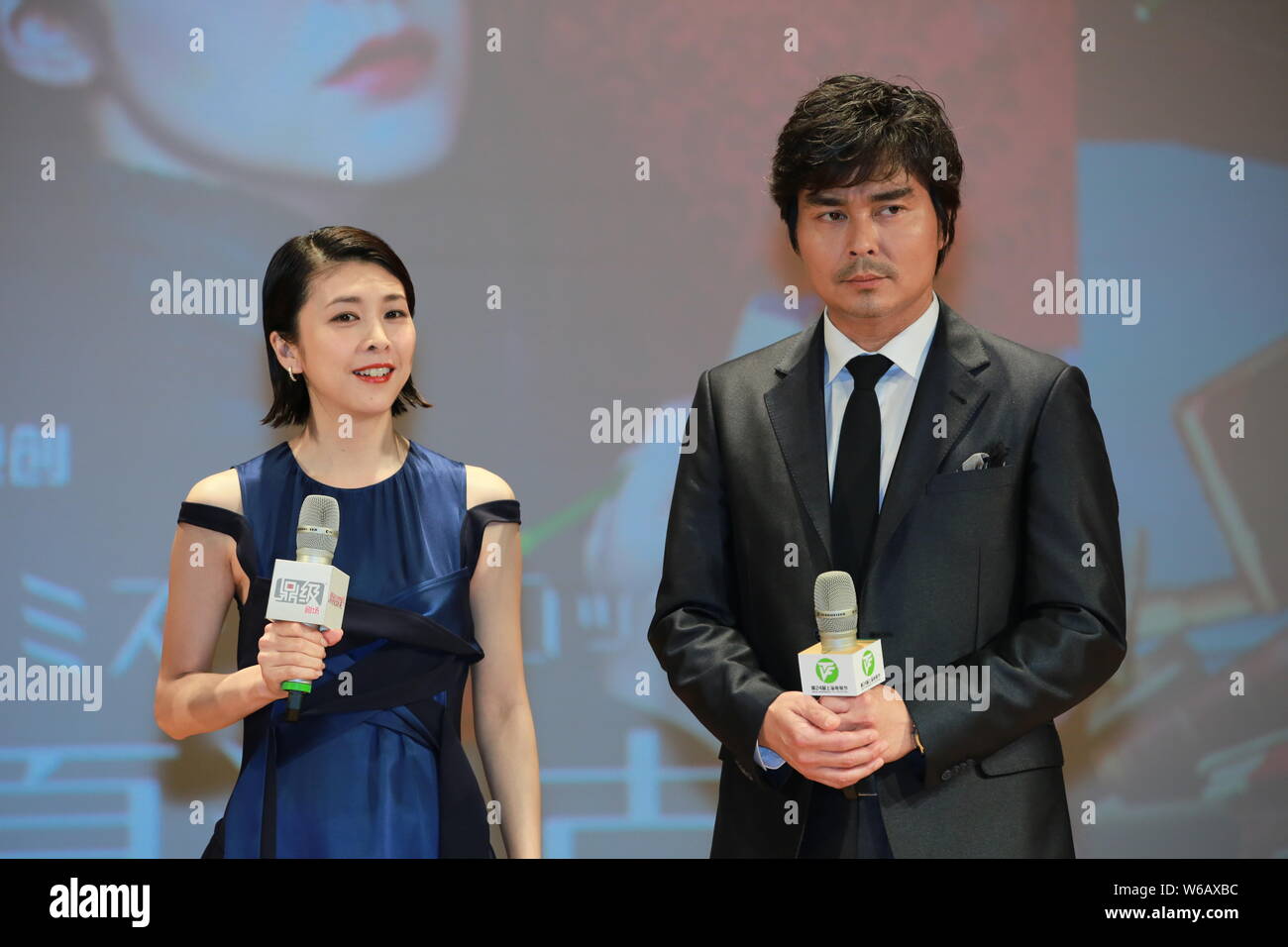 Japanese actress Yuko Takeuchi, left, and actor Yukiyoshi Ozawa attend ...