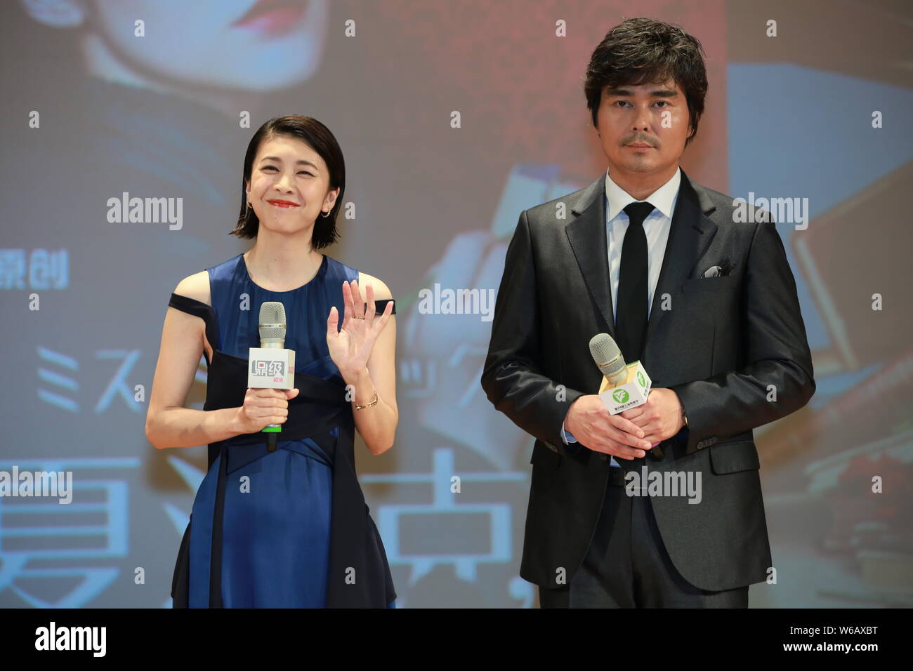 Japanese actress Yuko Takeuchi, left, and actor Yukiyoshi Ozawa attend ...