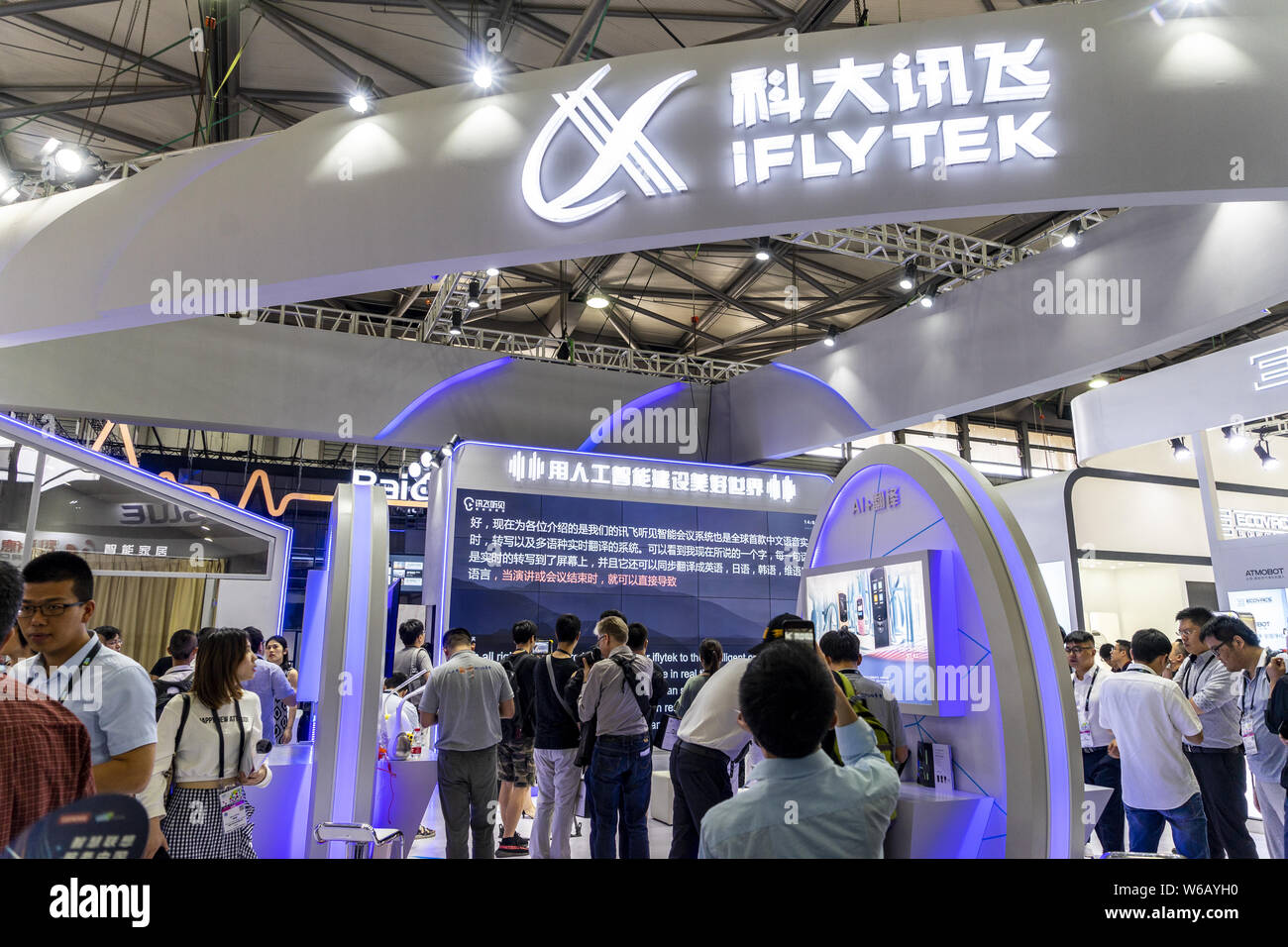 --FILE--People visit the stand of IFlytek during an exhibition in ...