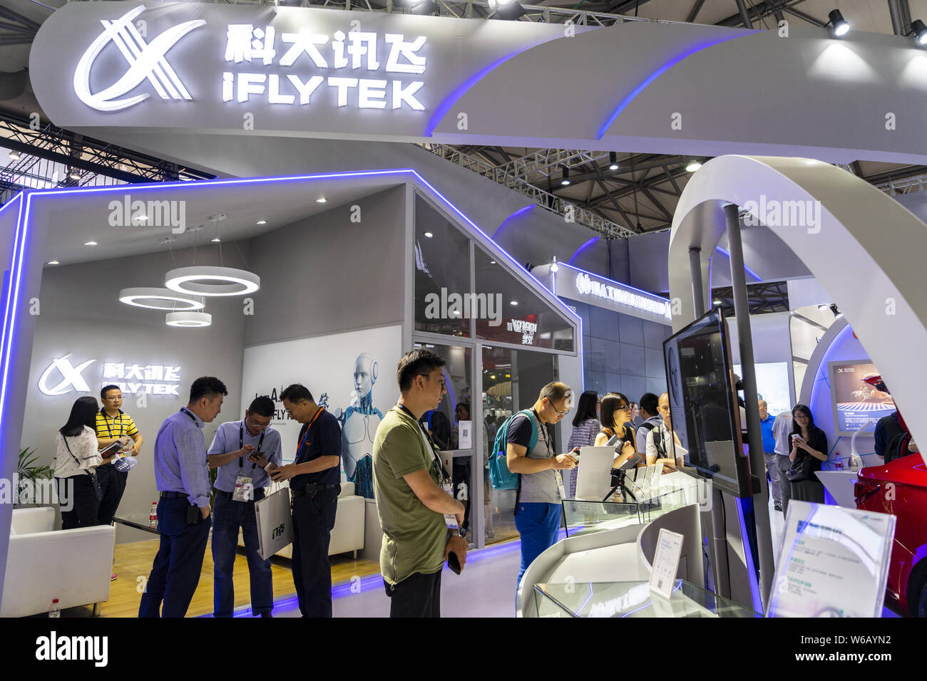 --FILE--People visit the stand of IFlytek during an exhibition in ...