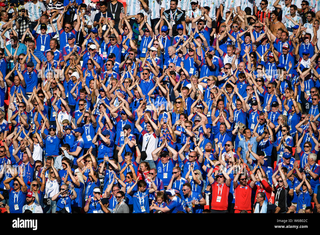 Iceland football fans cheer for their team competing against Argentina ...