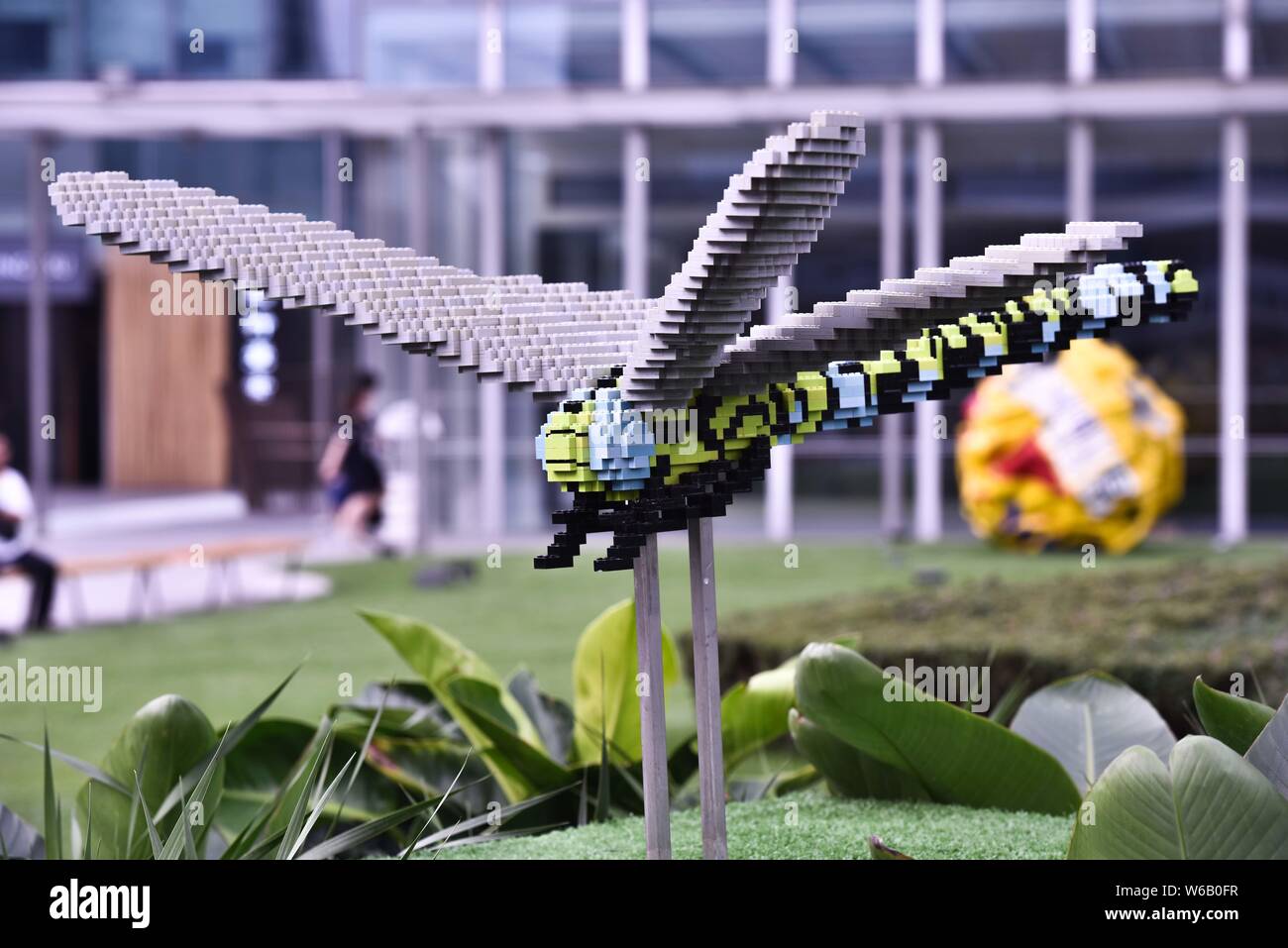 A Lego sculpture of dragonfly created by New York-based artist Sean ...