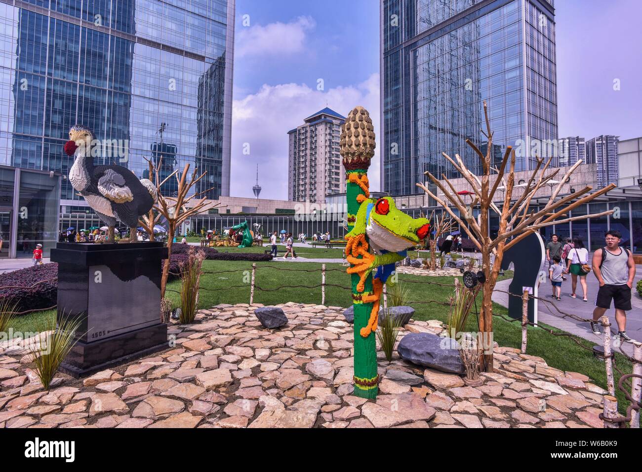 Visitors look at Lego sculptures created by New York-based artist Sean ...