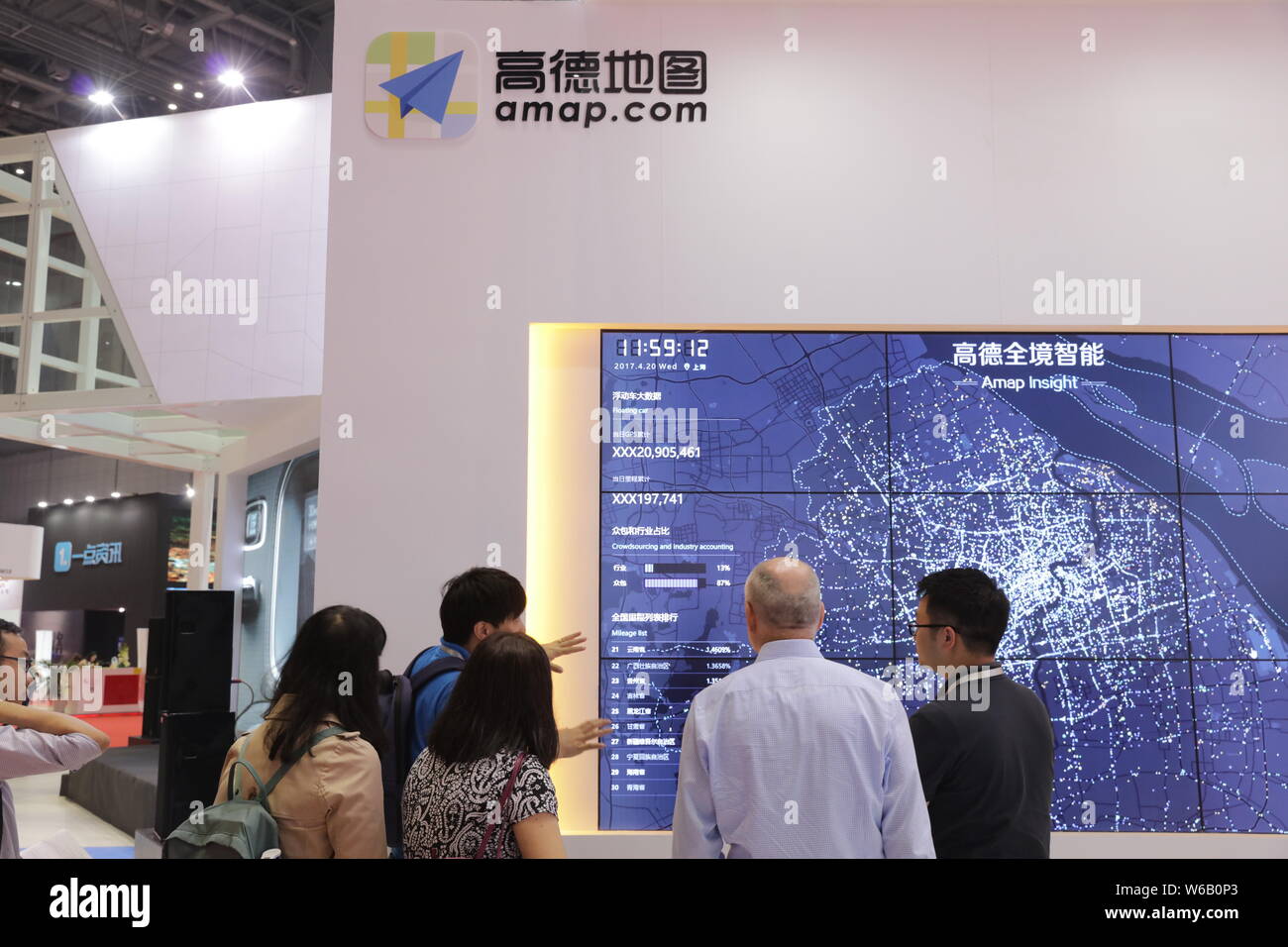--FILE--People visit the stand of AutoNavi (amap.com), the Chinese map ...