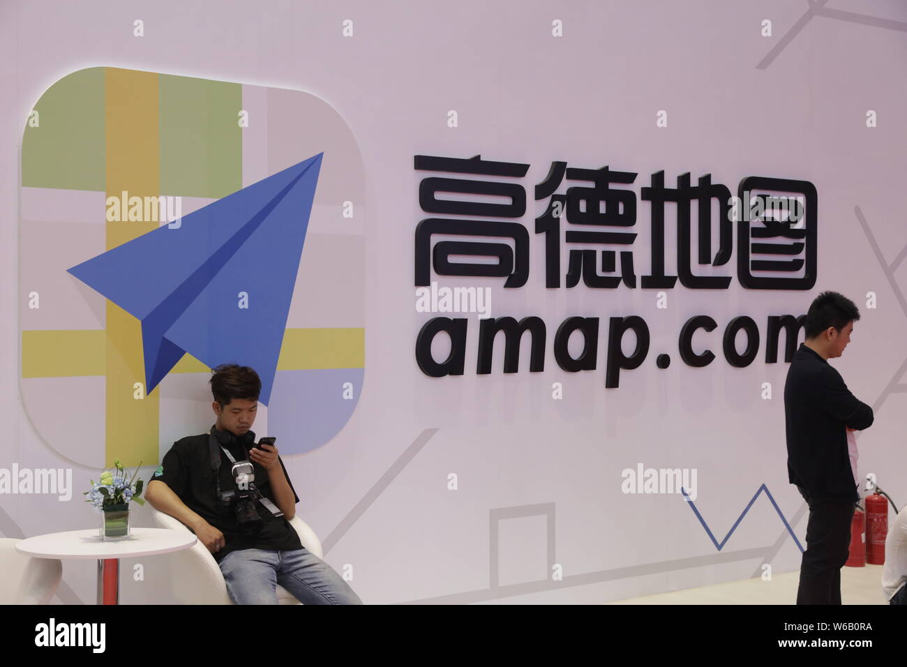 --FILE--People visit the stand of AutoNavi (amap.com), the Chinese map ...