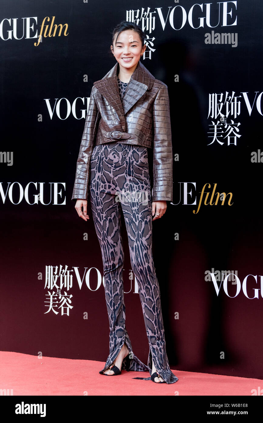 Chinese model Ju Xiaowen poses as she arrives on the red carpet for ...