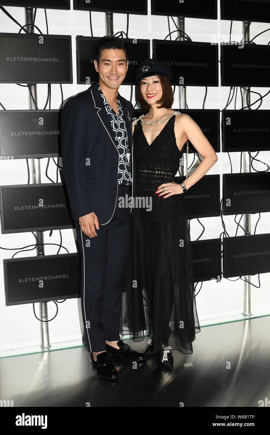 South Korean singer and actor Choi Si-won, left, of South Korean boy ...