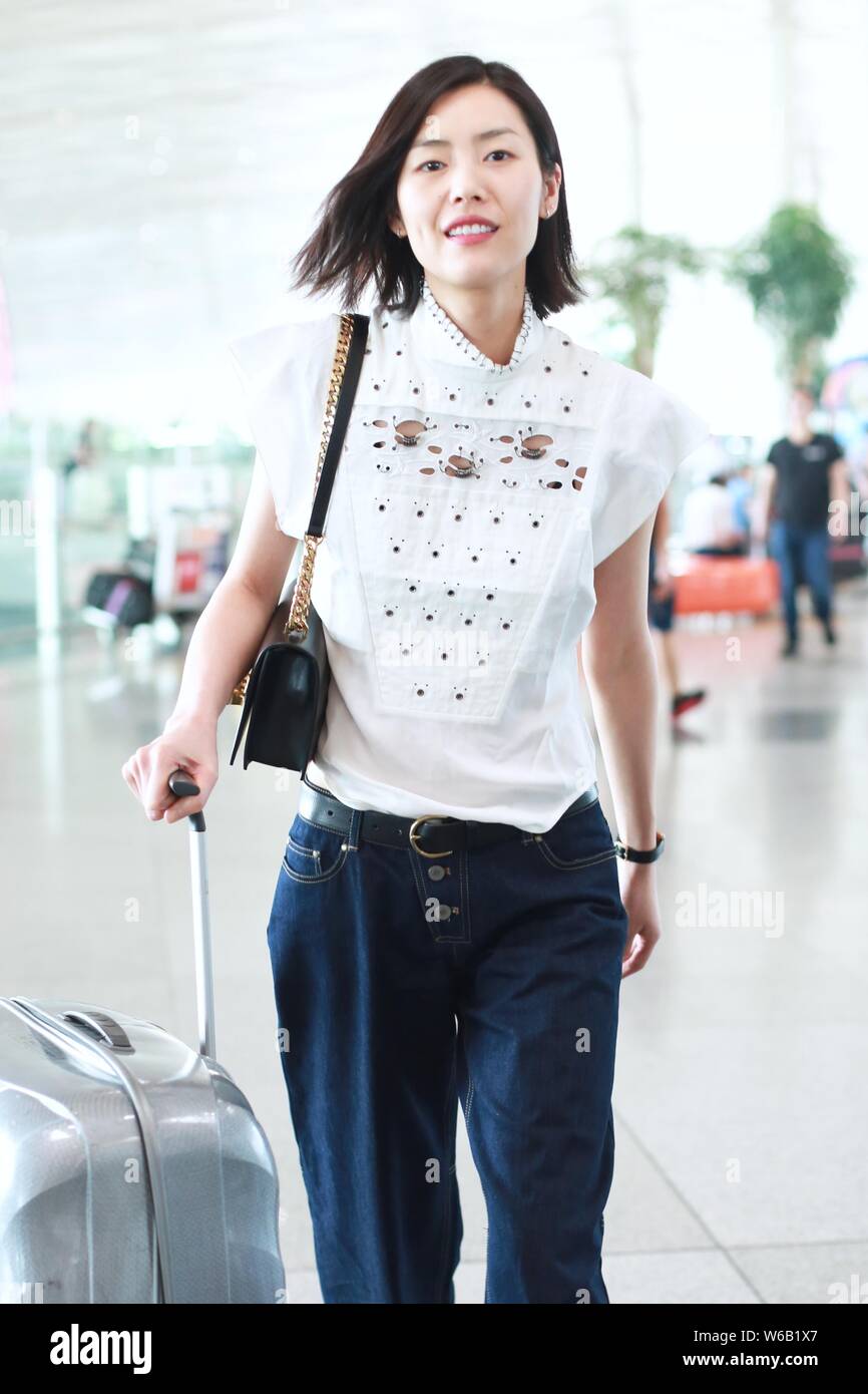 Chinese model Liu Wen is pictured as she arrives at the Beijing Capital ...