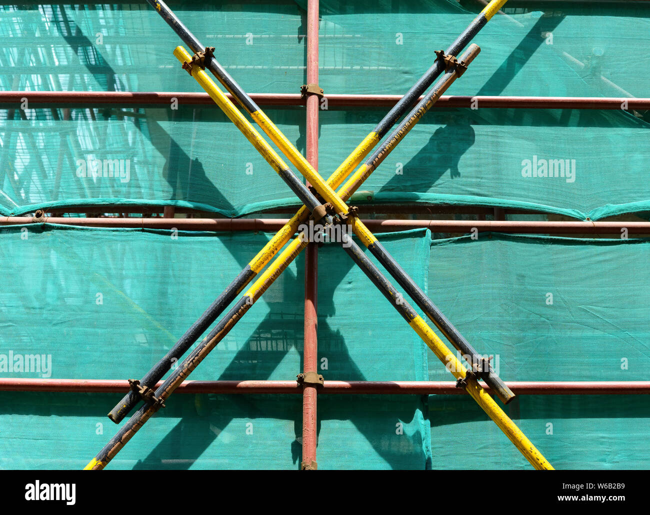 scaffolding and protection netting on an unfinished building Stock ...