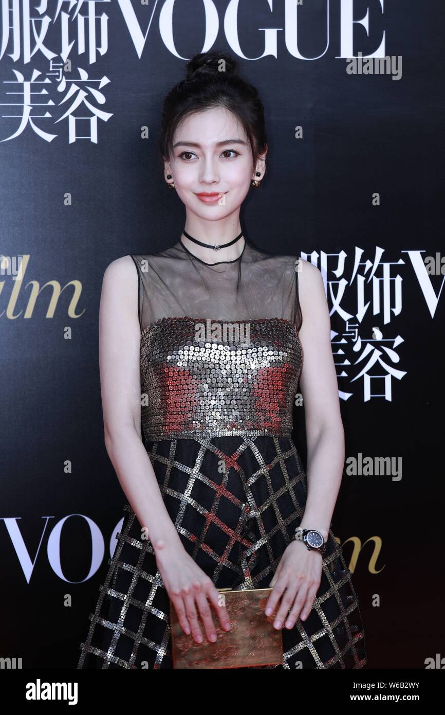 Hong Kong actress Angelababy poses as she arrives on the red carpet for Vogue Film in Shanghai ...