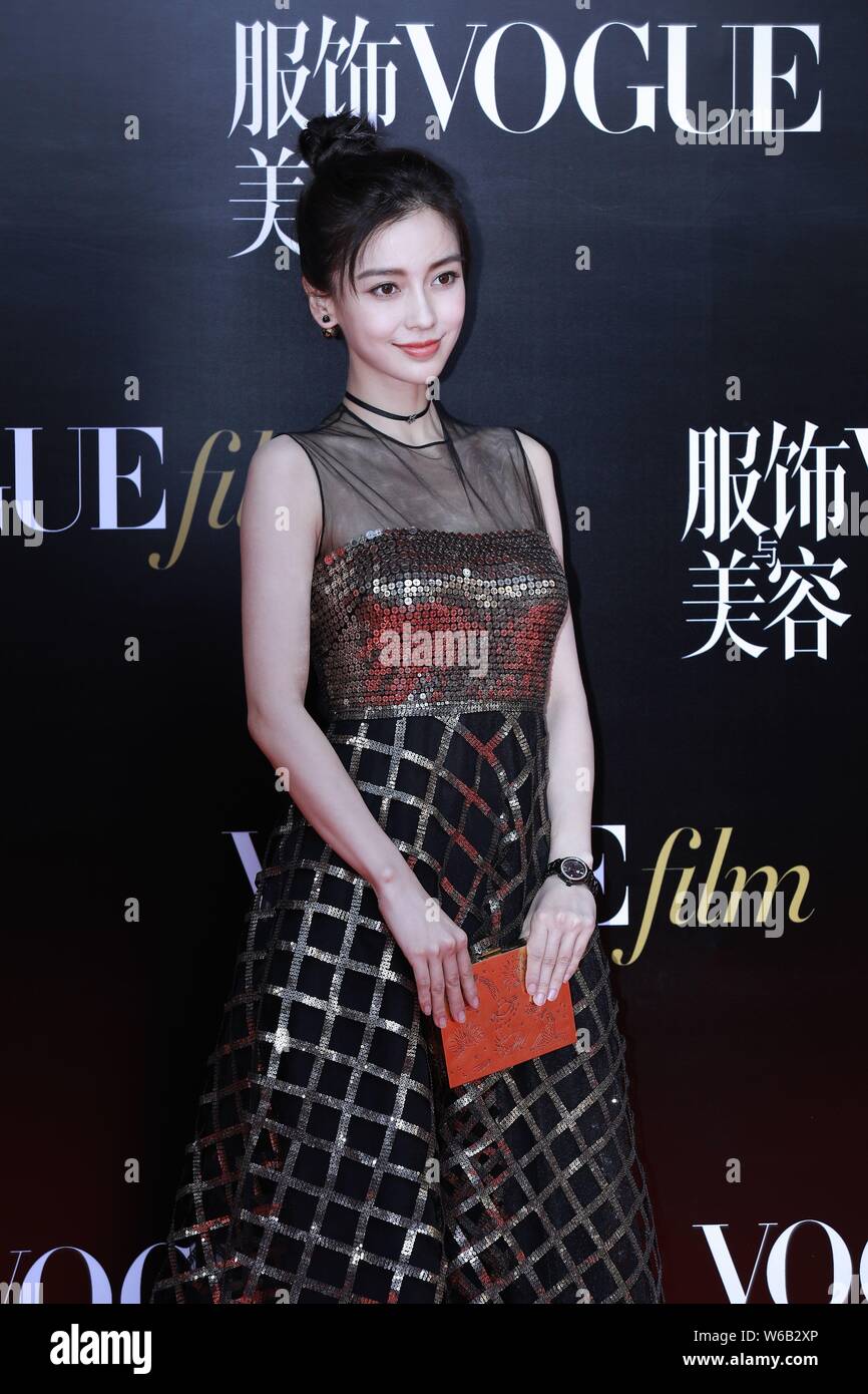 Hong Kong actress Angelababy poses as she arrives on the red carpet for Vogue Film in Shanghai ...