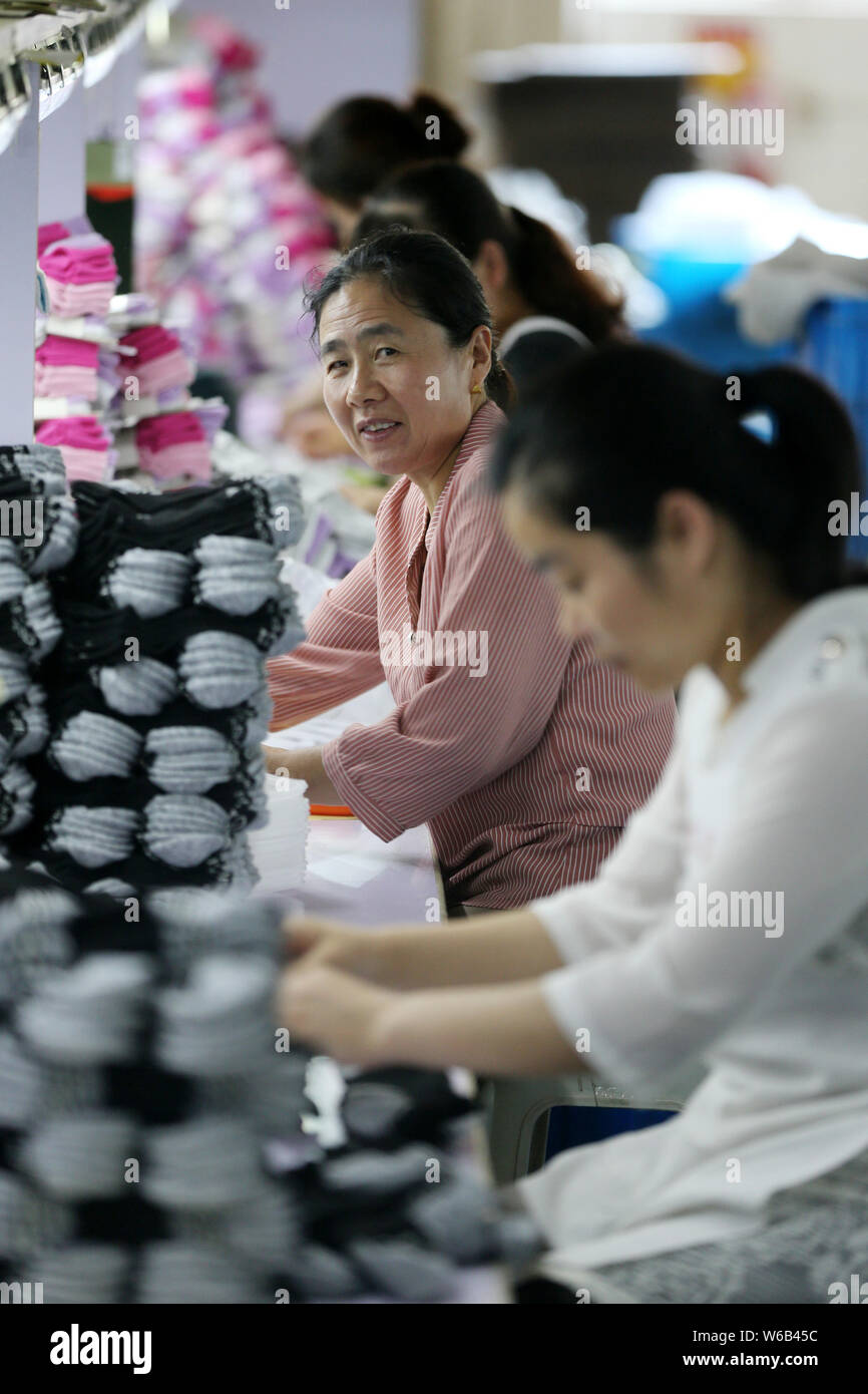 China chinese socks factory hi-res stock photography and images - Alamy