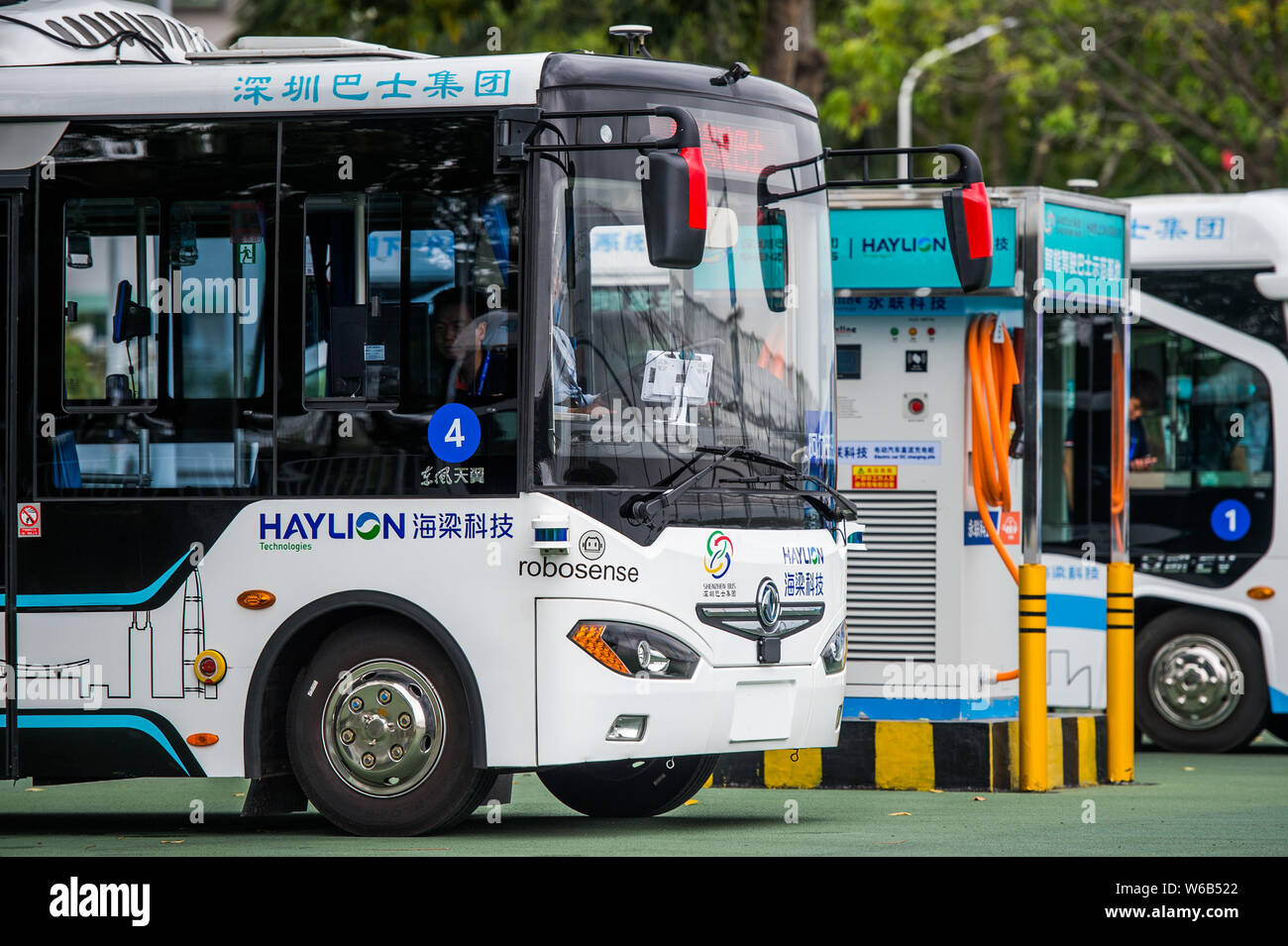 Alphabus smart buses with self-driving bus technology are pictured at a ...