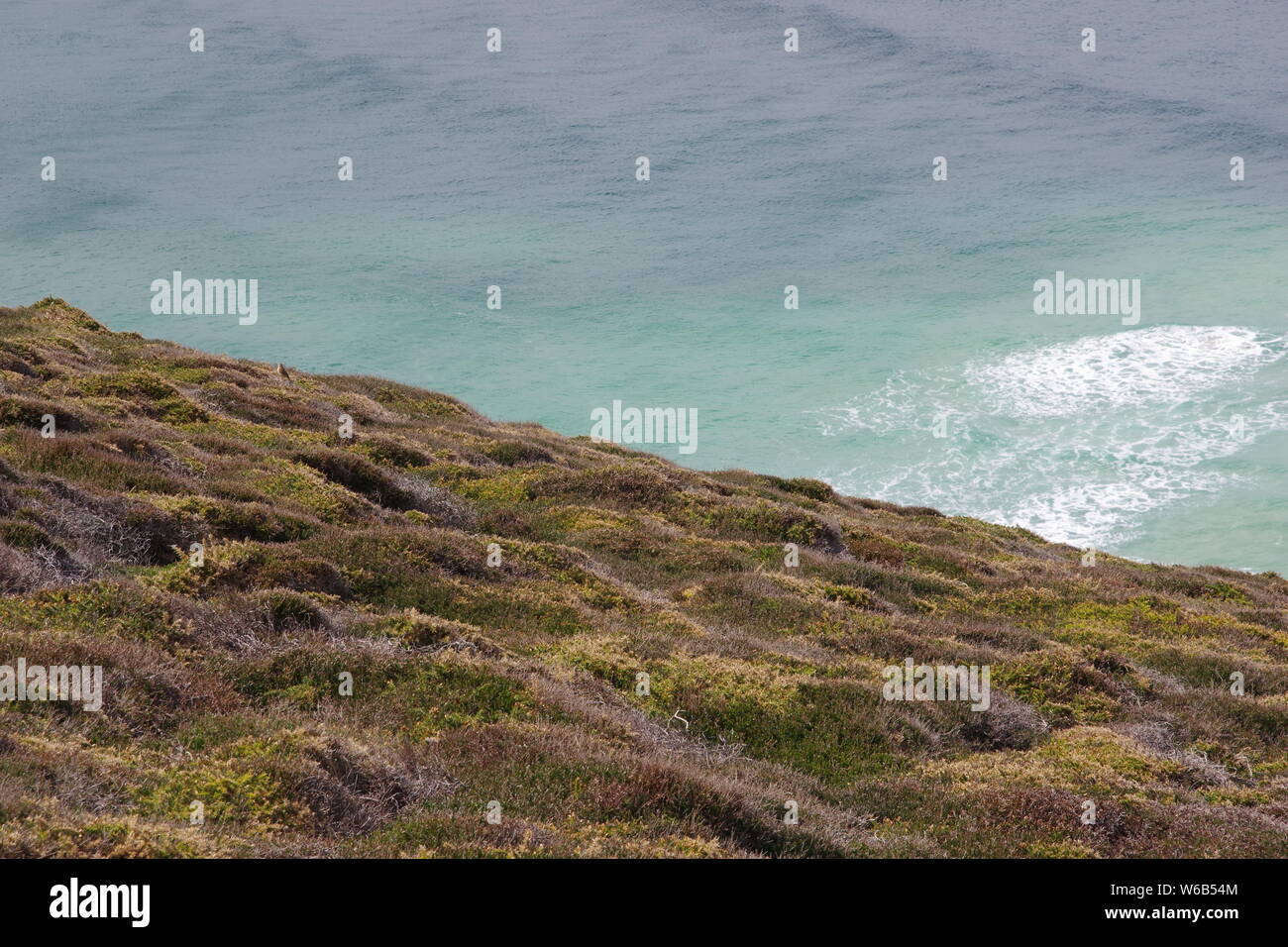 Looking Down from the Clifftop onto Waves of a Turquoise Sea at Chapel ...