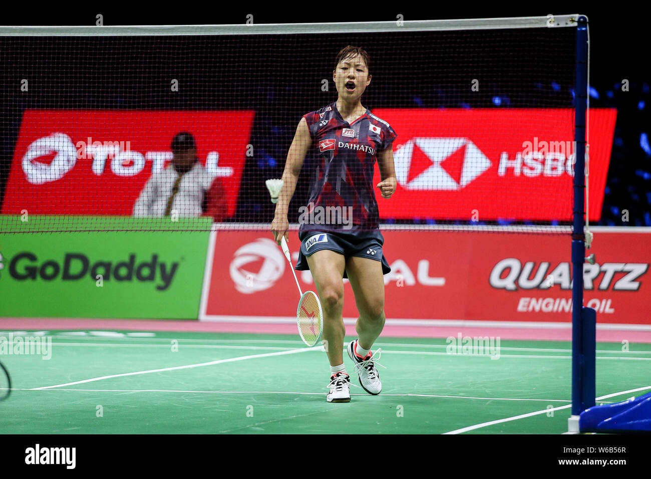 Nozomi Okuhara of Japan celebrates after winning a point against ...