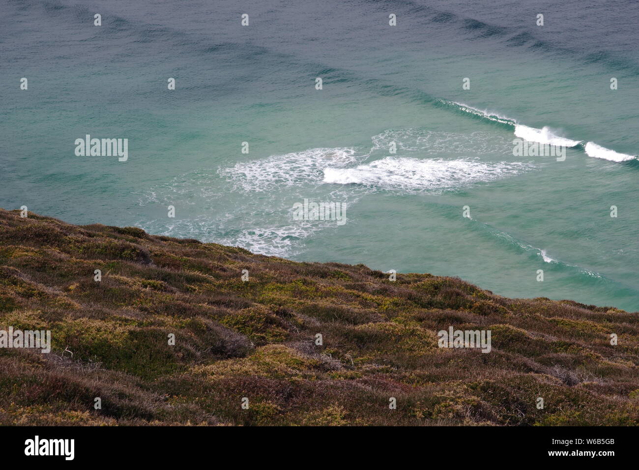 Looking Down from the Clifftop onto Waves of a Turquoise Sea at Chapel ...