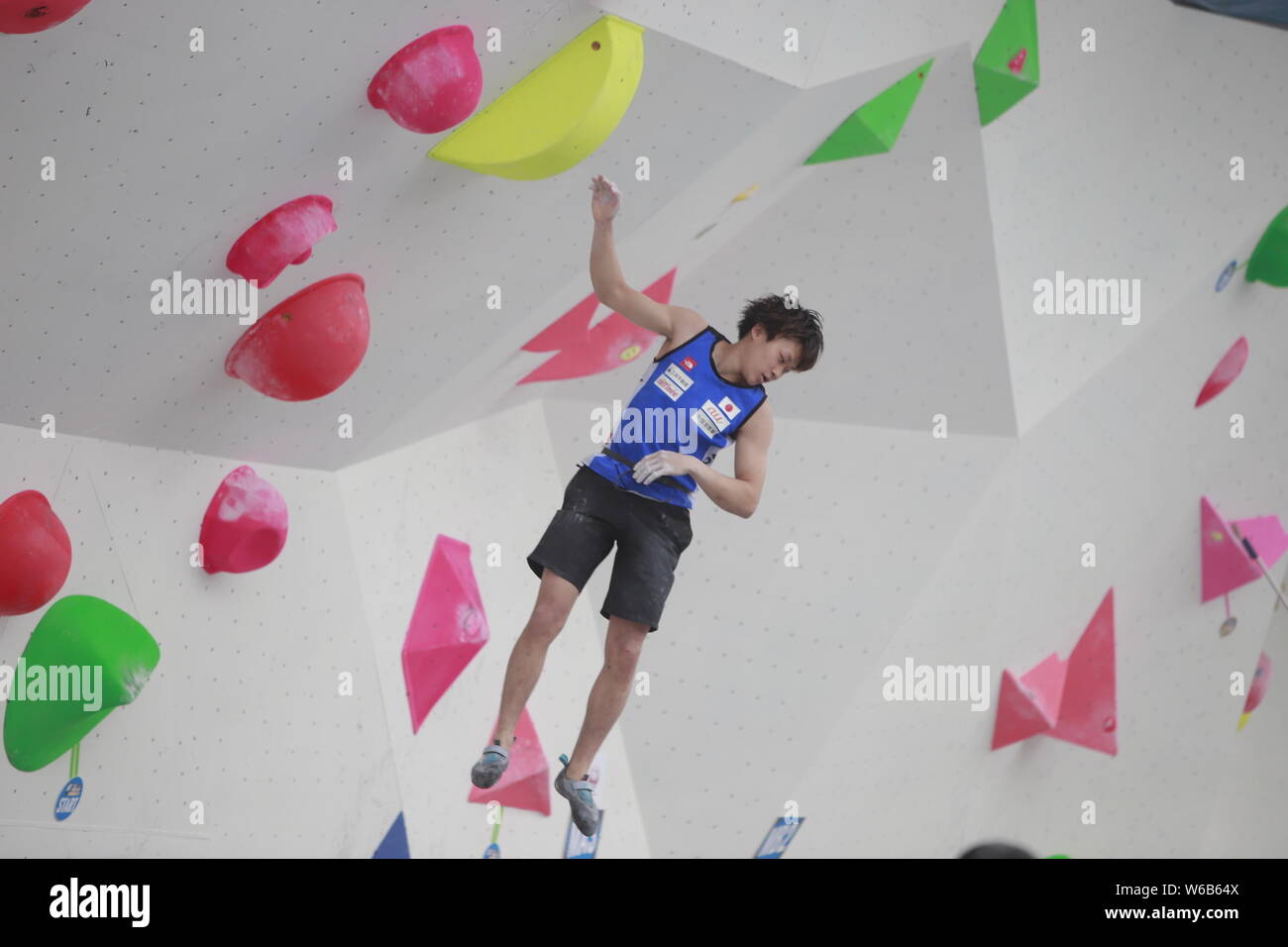 Yoshiyuki Ogata of Japan competes in the men's qualification bouldering ...