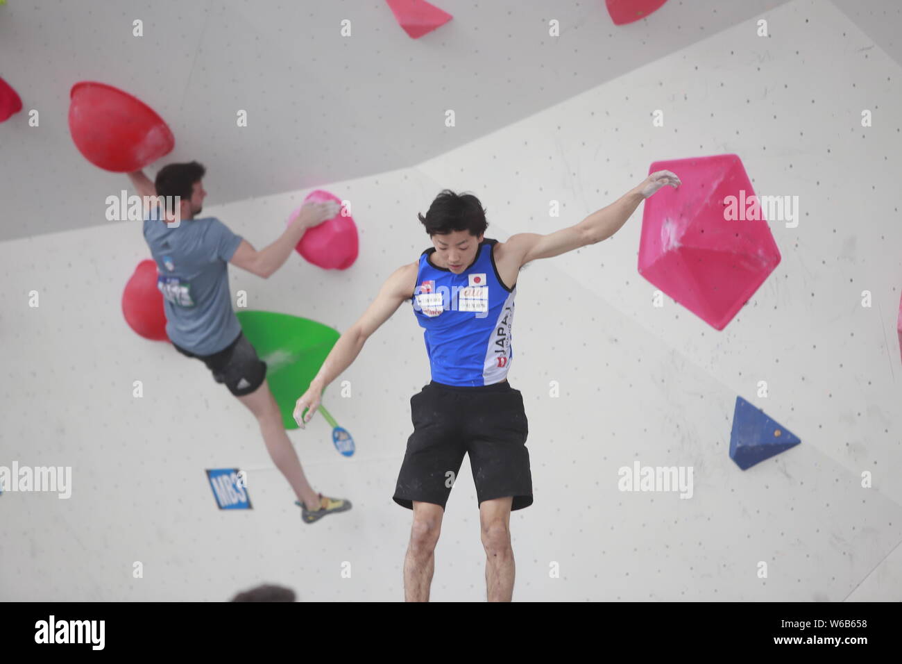 Kokoro Fujii of Japan competes in the men's qualification bouldering ...