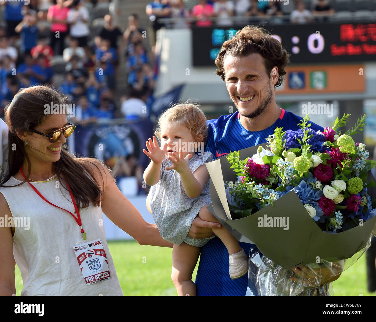 Uruguayan football player Diego Forlan, center, of Hong Kong's Kitchee ...
