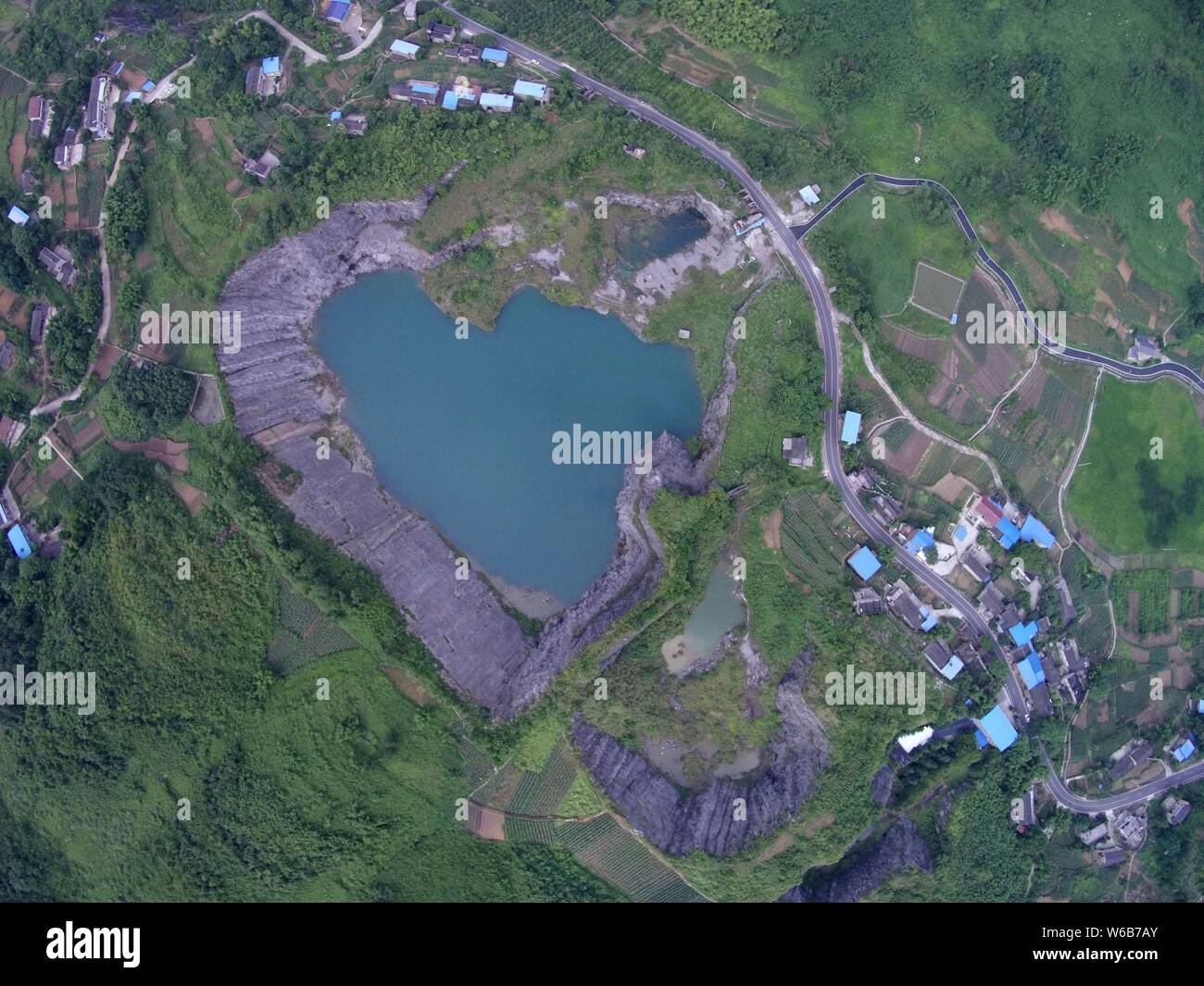 Aerial view of a heart-shape pond which was once a stone quarry ...