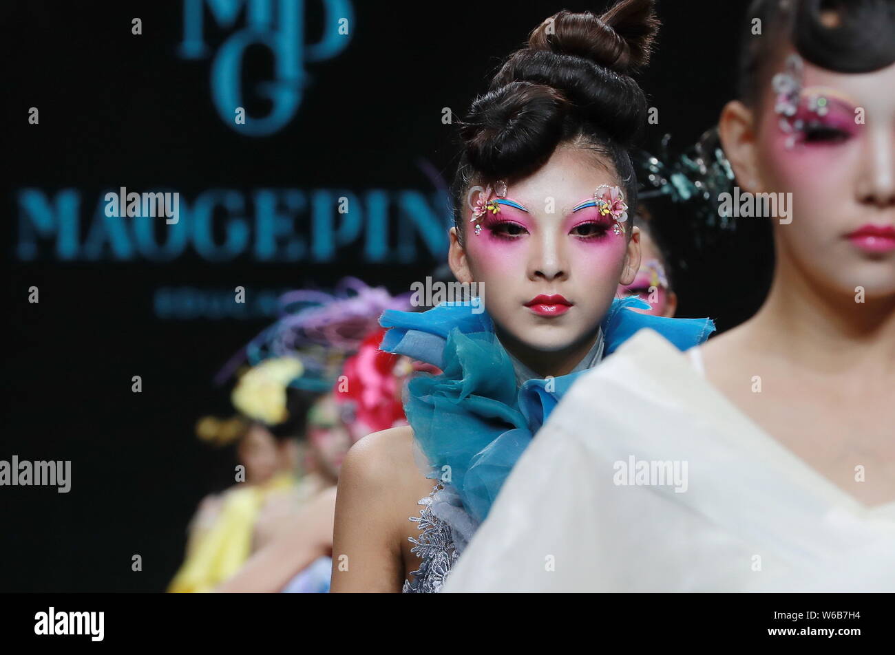 Chinese models display new creations at the Maogeping Makeup Show in ...