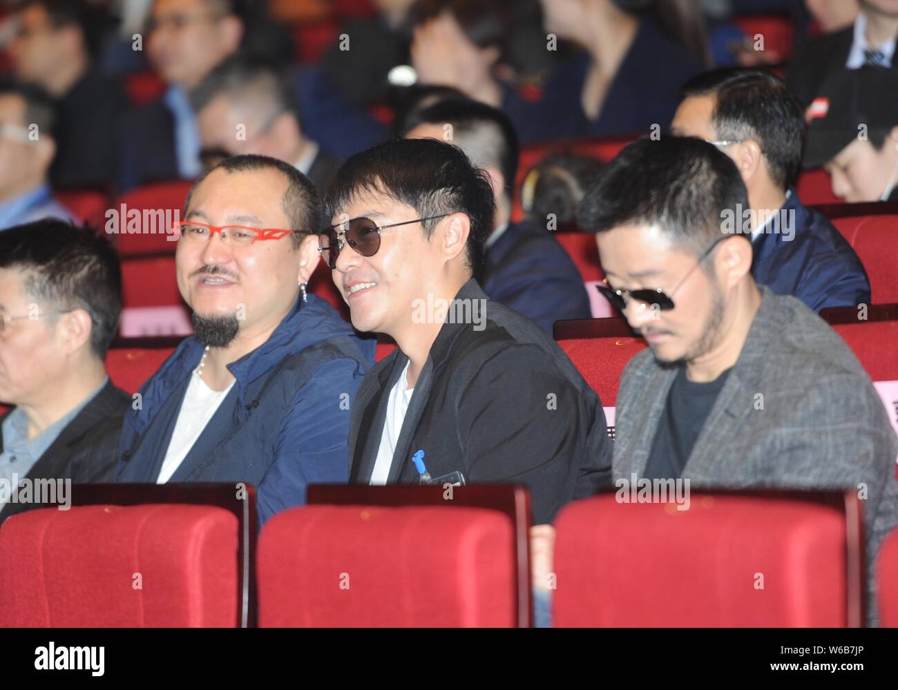Chinese actors Cheng Sicheng, center, and Wu Jing, right, attend the ...