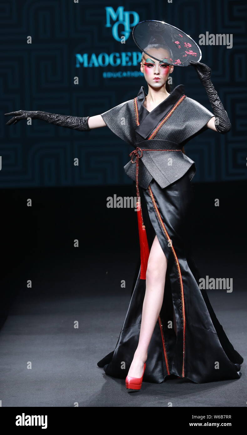 A Chinese model displays a new creation at the Maogeping Makeup Show in ...