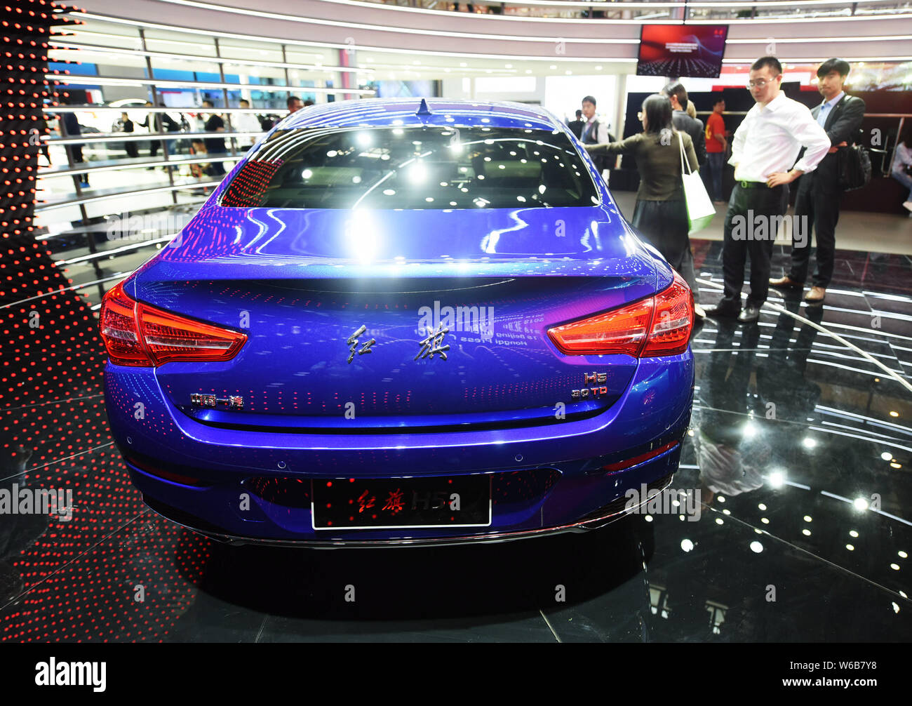 A Hongqi (Red Flag) H5 sedan of China FAW Group Corp. is on display ...
