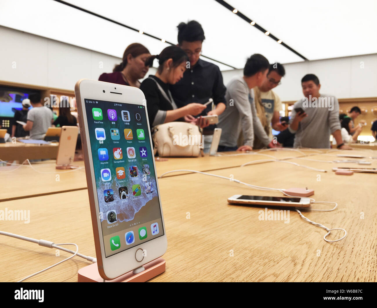 --FILE--An iPhone 8 Plus smartphone is on display at an Apple Store in ...
