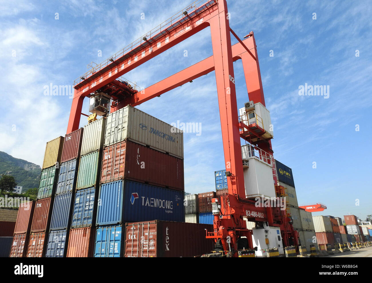 Crane vehicle lifts container hi-res stock photography and images - Alamy