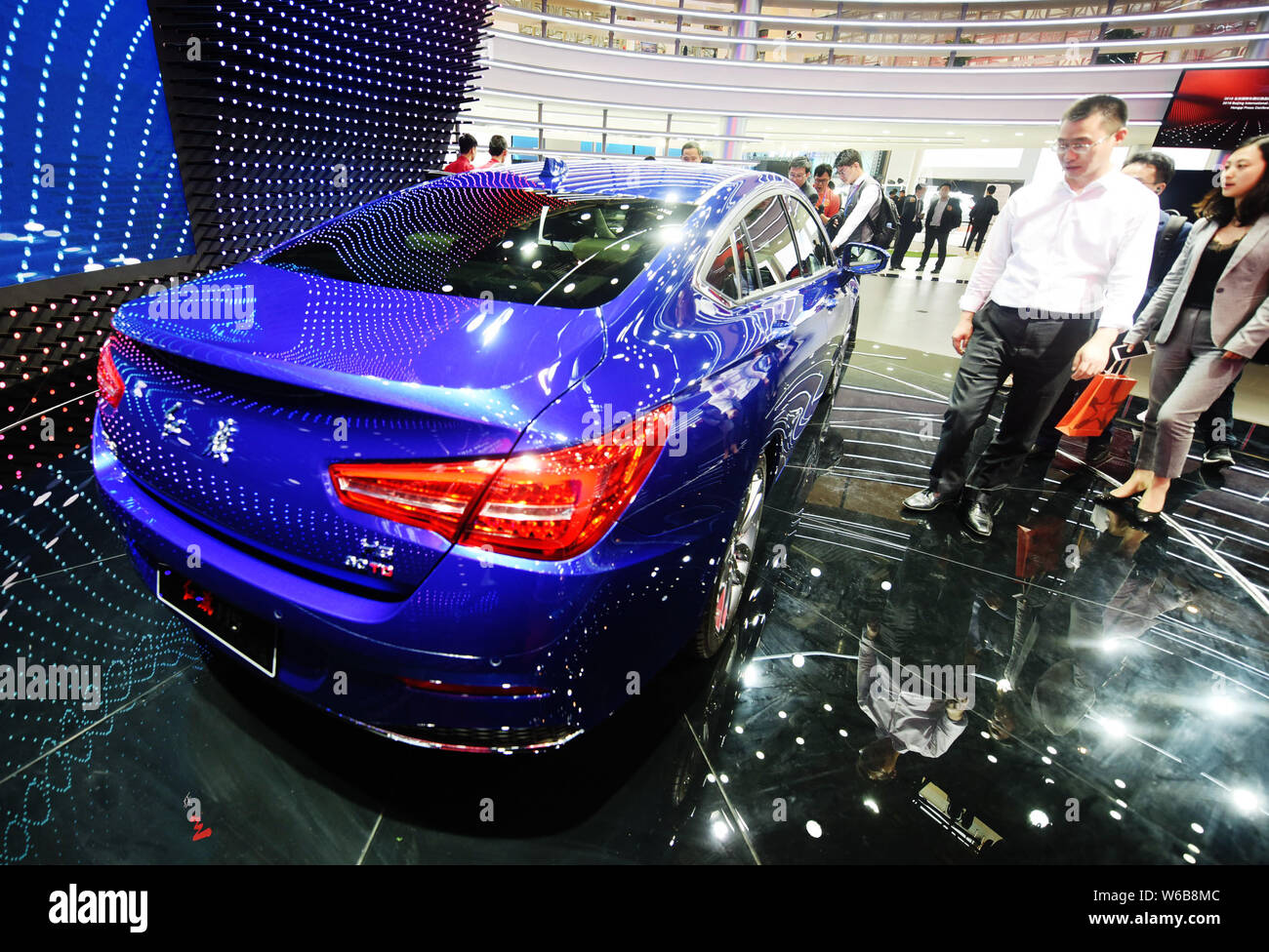 A Hongqi (Red Flag) H5 sedan of China FAW Group Corp. is on display ...