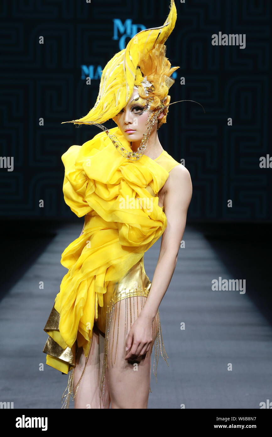 A Chinese model displays a new creation at the Maogeping Makeup Show in ...
