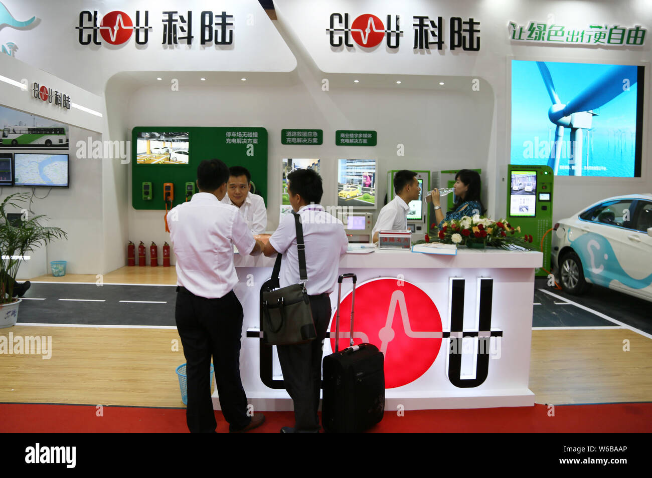 --FILE--People visit the stand of Shenzhen Clou Electronics Co. during ...
