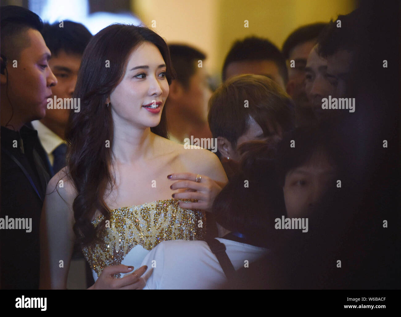 Taiwanese model and actress Lin Chi-ling attends a promotional event for domestics brand "Rotai ...